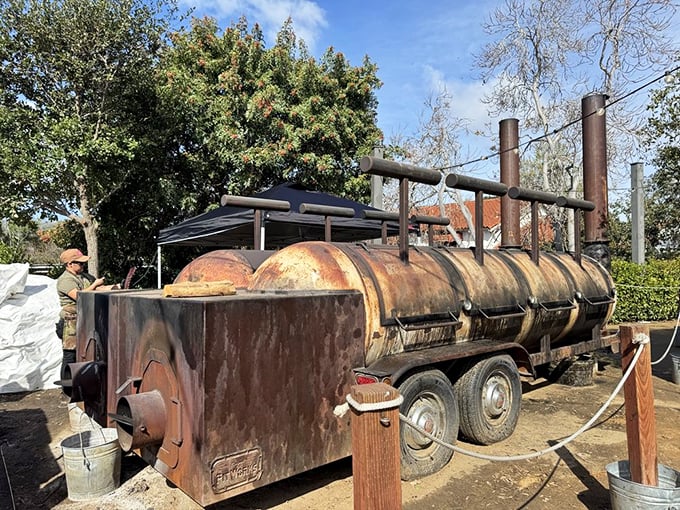 The massive smoker: part industrial equipment, part magic machine, all working overtime to create edible happiness.