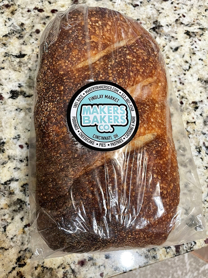 This sourdough isn't just bread; it's an achievement with a crust that probably sounds like a symphony when you squeeze it.