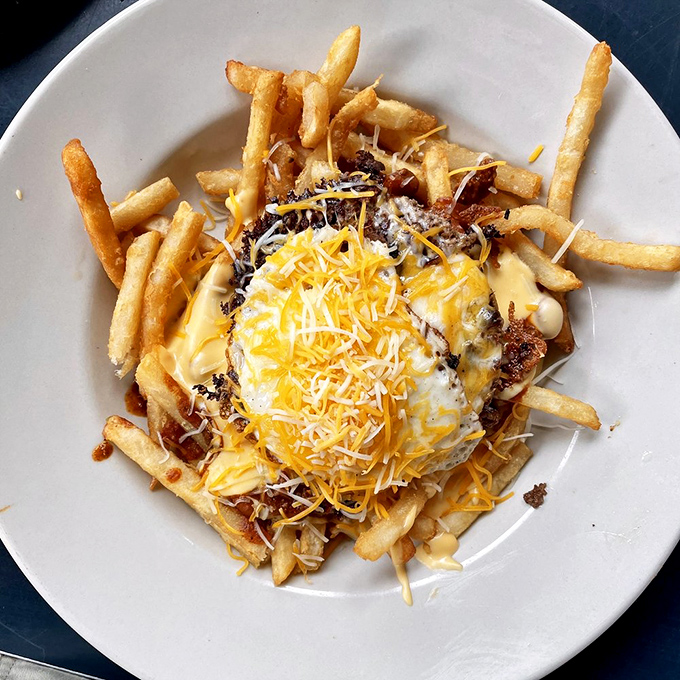 The St. Louis Slinger: where fries, cheese, and a perfectly cooked egg come together in a harmony that makes breakfast jealous. 