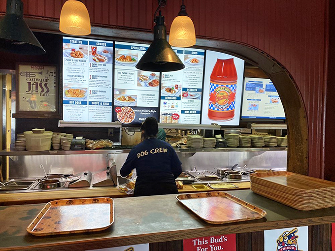 The "Dog Crew" works their magic behind the scenes. These culinary conductors orchestrate the symphony of flavors that made Tony Packo's famous.