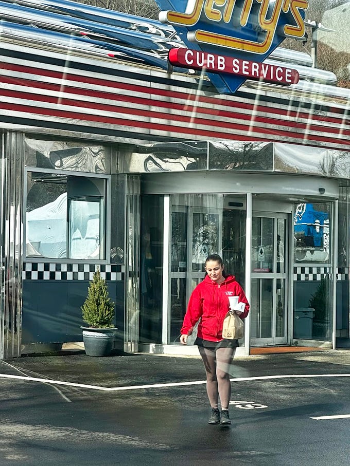 The staff at Jerry's carries on traditions that predate smartphone ordering apps, delivering food with a smile that no delivery service can match.