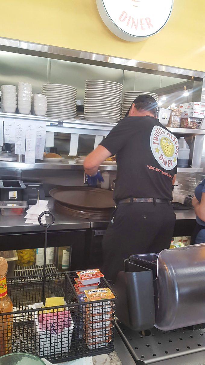 Behind every great biscuit is a dedicated kitchen wizard. The staff works their magic while hungry patrons wait for their carb-loaded treasures.