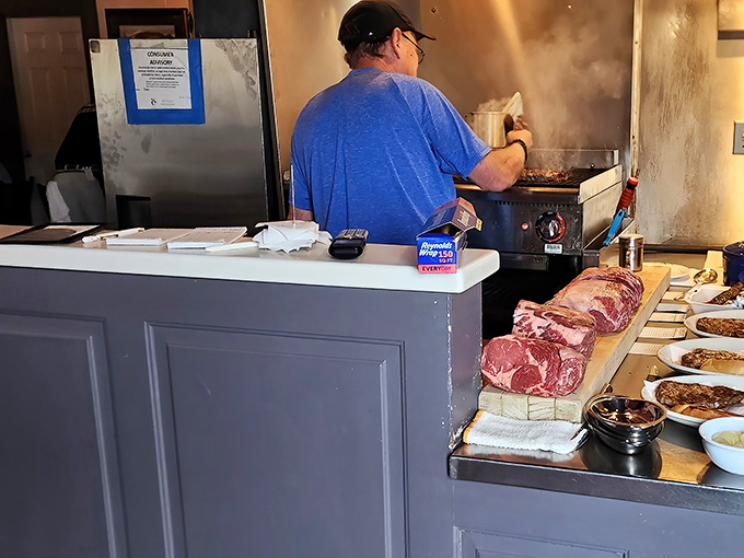 The kitchen staff works their magic at the grill. Like watching Hendrix play guitar—simple tools, extraordinary results.