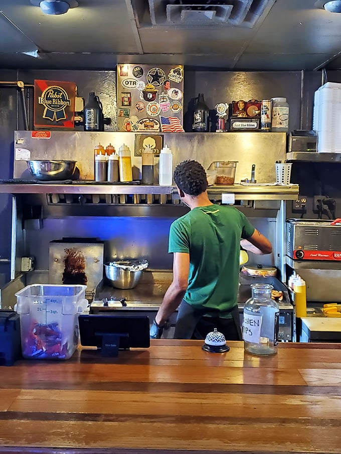 The kitchen's heartbeat&mdash;where magic happens without fanfare. No tweezers or foam here, just honest cooking that speaks volumes.