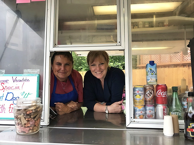 The window to seafood paradise, where friendly faces and coastal hospitality transform fresh catches into unforgettable meals.