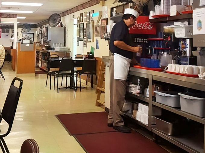 The soda fountain setup hasn't changed in decades, and that's exactly how the regulars who line the counter like it.