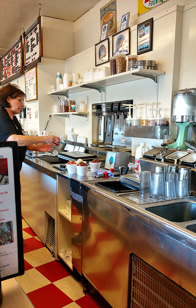Ice cream artisans at work. There's a certain ballet to the scoop-and-serve that takes years to perfect.