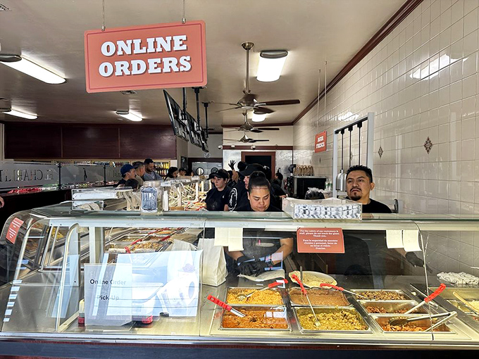 Where the magic happens: El Charrito's service counter showcases prepared dishes ready to satisfy the hungry masses who've made the pilgrimage.