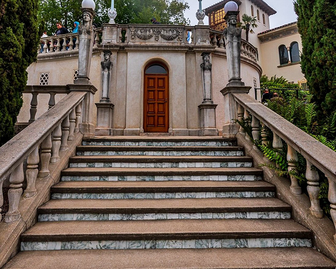 Every staircase at Hearst Castle tells a story, with classical statues standing guard like sentinels from another era.