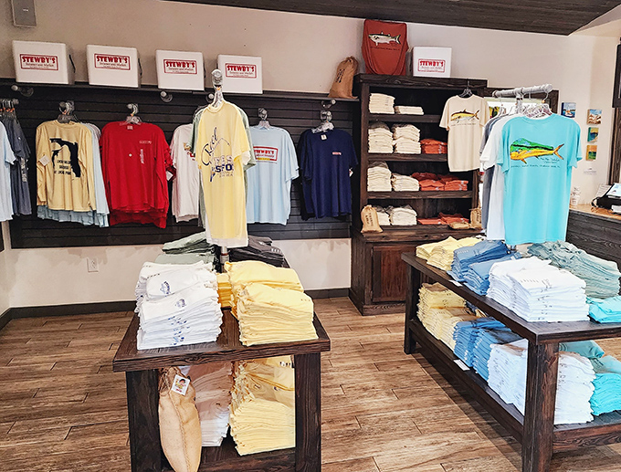 The merch area proves Stewby's isn't just a meal&mdash;it's a lifestyle. Those t-shirts are the Gulf Coast equivalent of concert souvenirs.