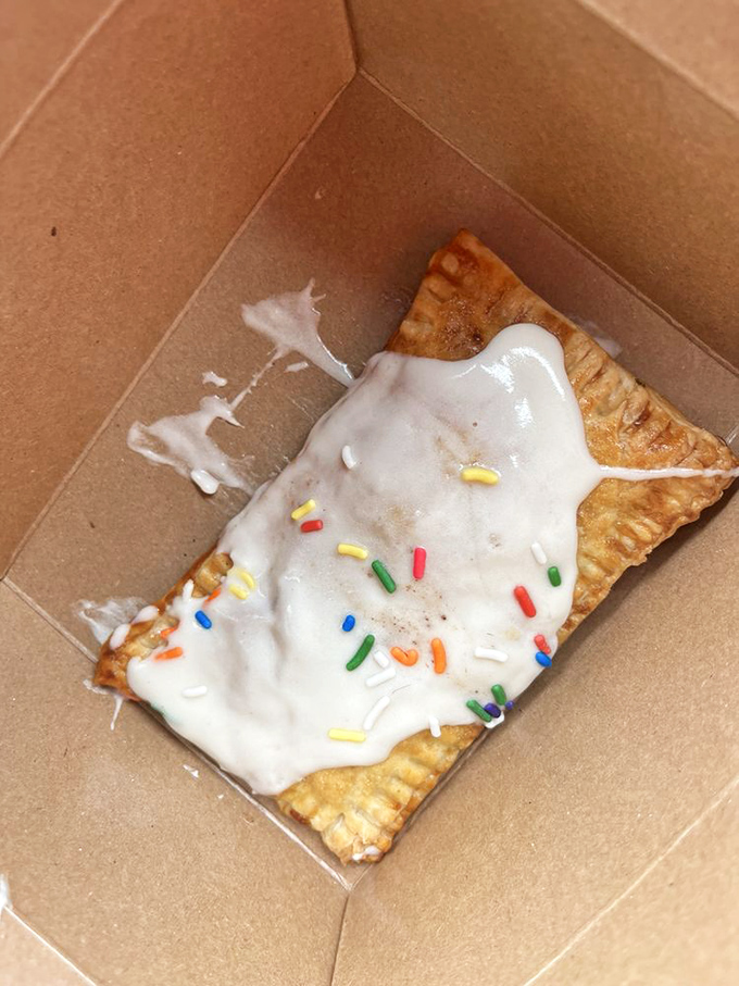 Not your average toaster pastry! This grown-up pop tart with its glossy icing and sprinkles is childhood nostalgia with adult sophistication.