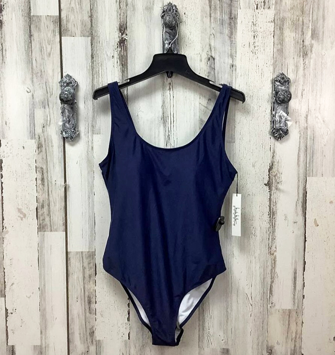 Navy simplicity meets summertime confidence. This classic one-piece proves timeless style never goes out of fashion, especially at these prices.