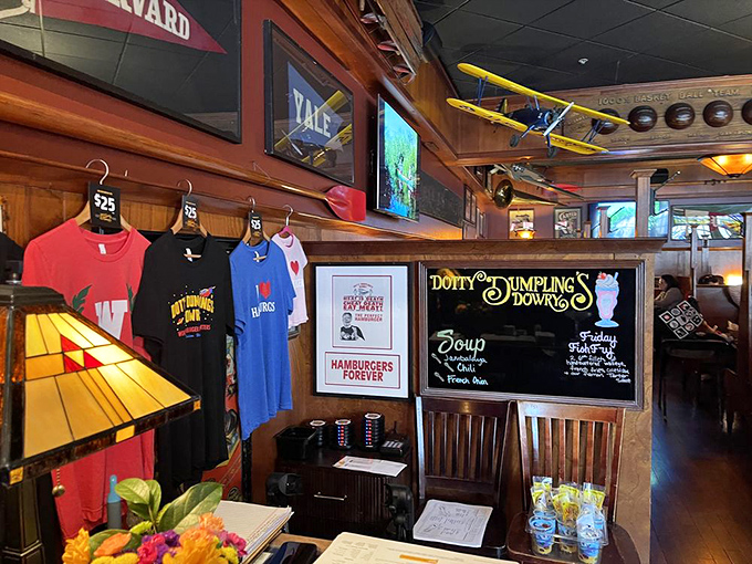 The merch wall proudly proclaims "HAMBURGERS FOREVER"&mdash;less a statement of menu options and more a life philosophy worth embracing.