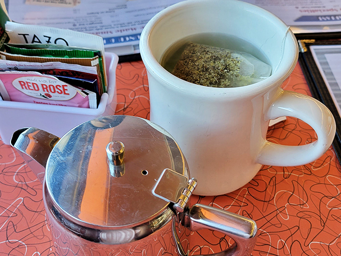 Tea service with all the fixings &ndash; civilization in a cup, ready to warm both hands and spirit.
