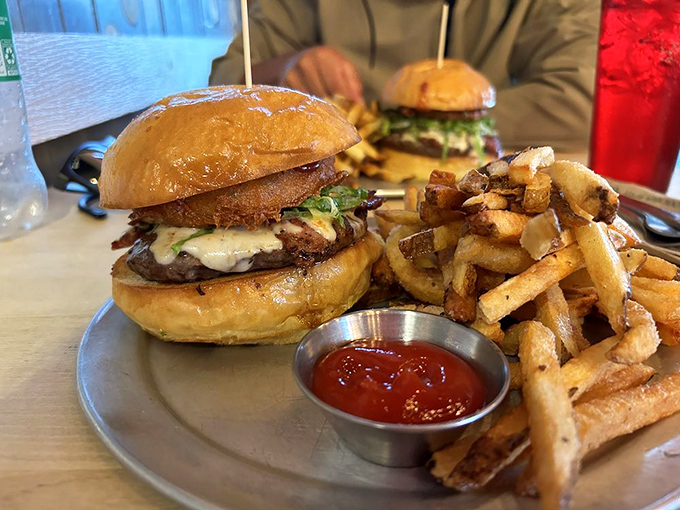 The Texas burger doesn't whisper about flavor &ndash; it announces itself with all the subtlety of a rodeo announcer. Those sweet potato wedges are the perfect sidekick.