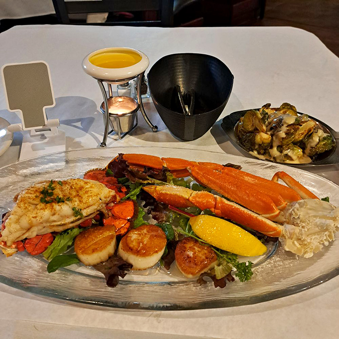 The Admiral's Feast: where lobster, scallops, and crab legs convene for a summit meeting of deliciousness. The melted butter is their translator.