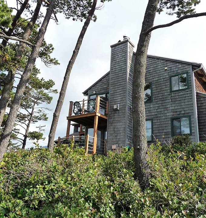 Cedar-shingled perfection nestled among shore pines. The quintessential Oregon coast vacation home that haunts your workday daydreams.
