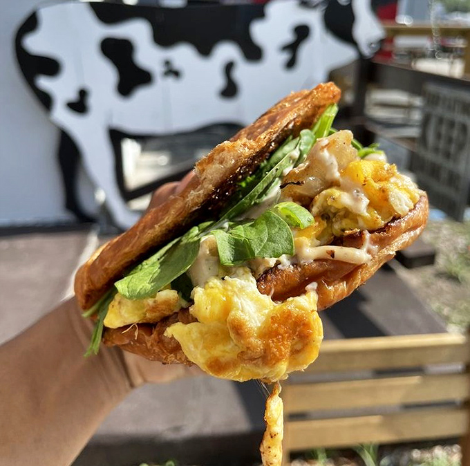 When breakfast sandwiches go to heaven, this is what they aspire to become - layers of egg, greens and protein creating morning magic.