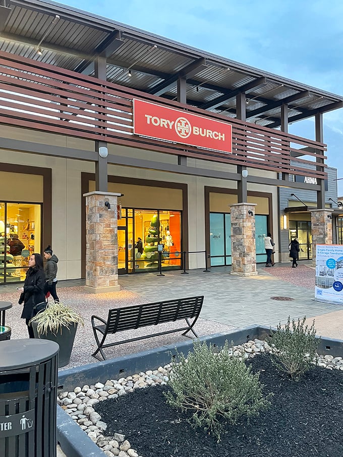 Tory Burch's signature orange-red storefront promises preppy luxury at prices that won't require explaining to your financial advisor.