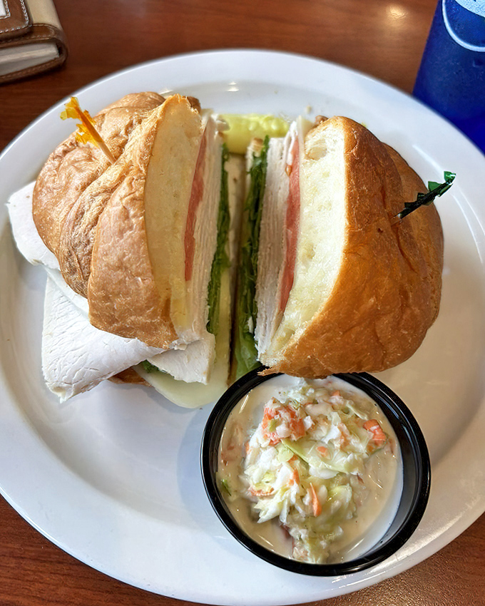 This sandwich isn't just stacked&mdash;it's engineered for maximum satisfaction, with layers that deserve their own geological survey.