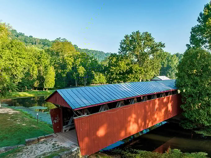 From this angle, you can appreciate how the bridge's metal roof has protected the wooden structure beneath for generations.