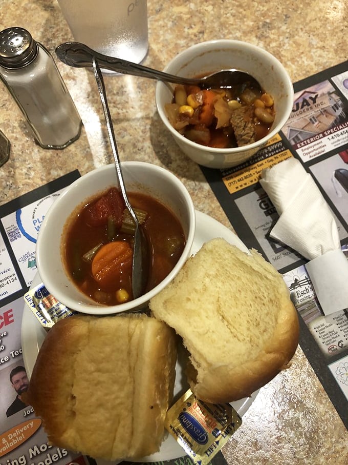 Two soups, one mission: to warm your soul. Those dinner rolls aren't just bread&mdash;they're edible spoons waiting for their moment to shine.