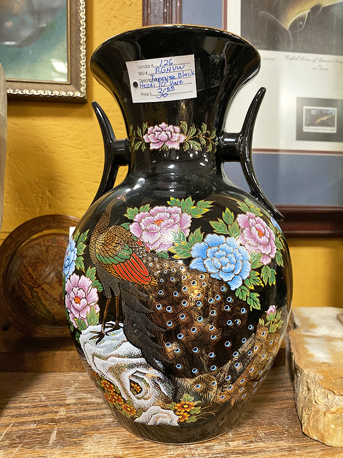 This Japanese vase with its peacock splendor doesn't just hold flowers—it commands attention like a diva taking center stage.