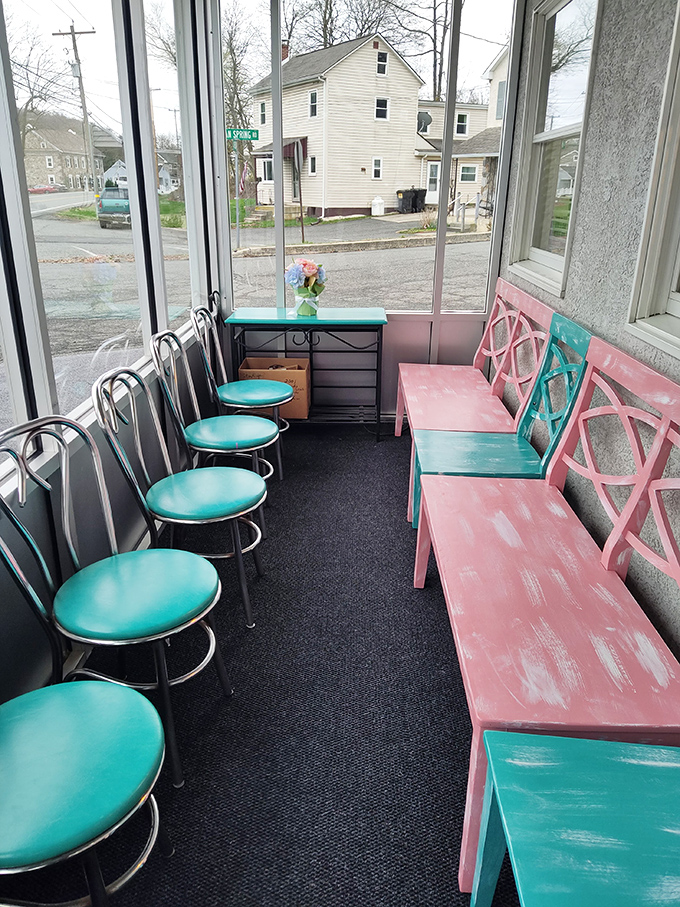 The waiting area's turquoise and pink seating feels like a '50s postcard come to life&mdash;worth every minute of anticipation.