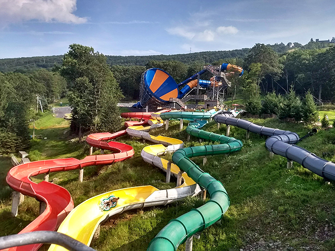 Colorful water slides snake down the mountain, proving that fun comes in all elevations and temperatures.