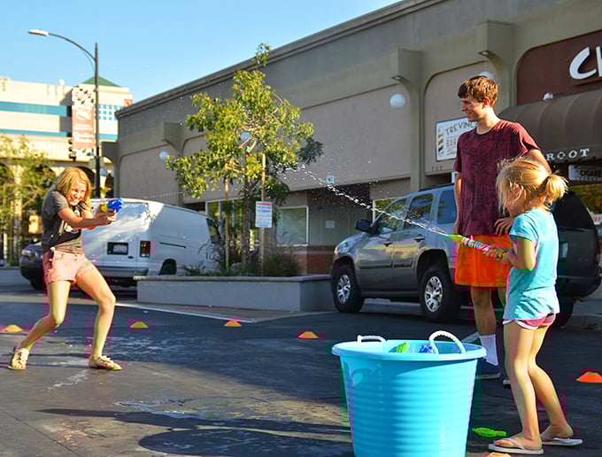 Summer in Modesto means impromptu water fights on downtown streets, where kids create their own cooling entertainment during those triple-digit days.