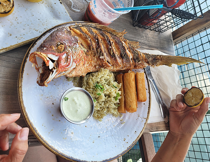 This whole fried snapper commands respect, arriving at your table like the catch of a lifetime.