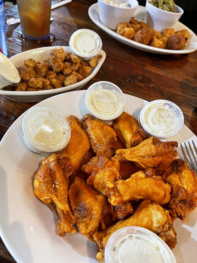 Buffalo wings that could make a Buffalonian nod in approval. Multiple dipping sauces because life's too short for sauce monogamy.