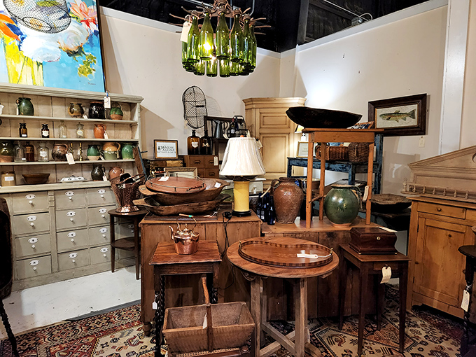 A symphony in wood and brass awaits in this corner where every table, lamp, and cabinet has survived decades to find its next home.