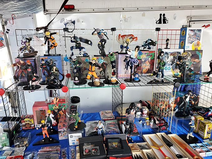 Anime figurines stand at attention, ready to march from this display grid straight to a collector's shelf of honor.