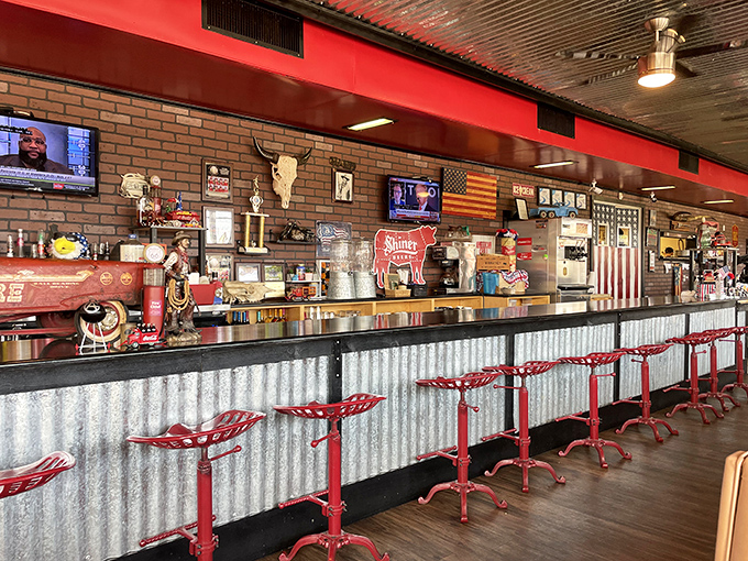 That corrugated metal bar front with vintage-style stools isn't just seating&mdash;it's a front-row ticket to the greatest show on earth: watching BBQ masters at work.