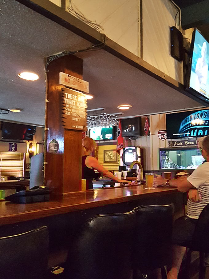 The welcoming bar beckons with cold drinks and warm hospitality that defines true Southern charm.