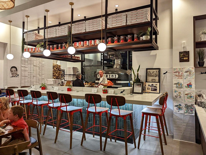 The open kitchen bar seating offers dinner and a show&mdash;watch pizza artisans transform simple ingredients into edible masterpieces while you sip your wine.