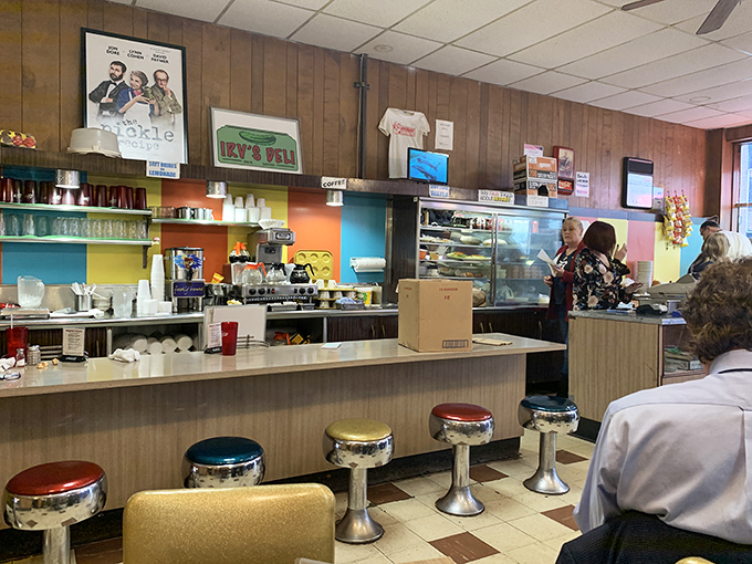 The counter stools have witnessed decades of regulars leaning in for that first magical bite of pastrami perfection.