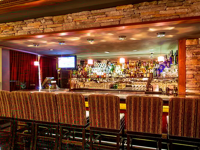 A bar stocked so comprehensively it looks like the United Nations of spirits. The perfect backdrop for stories that improve with each telling.