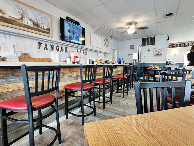 More than just a counter&mdash;it's breakfast theater where regulars have favorite seats. The wooden accents and display of photos create instant belonging.