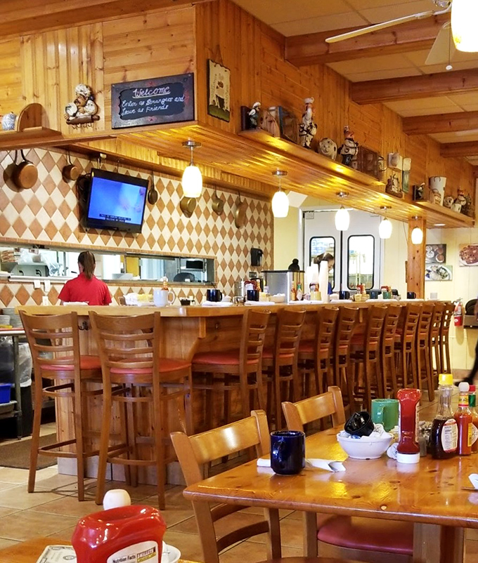 The breakfast bar &ndash; where culinary magic happens behind the scenes while collectibles stand guard from above.