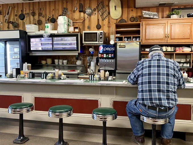 One man at the counter represents thousands who've sat there before him, proving some traditions are worth preserving in our swipe-right world.