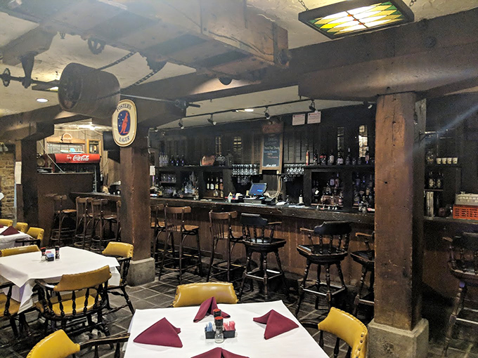 The bar area maintains that perfect balance between "historic charm" and "I can actually get a proper Manhattan here."