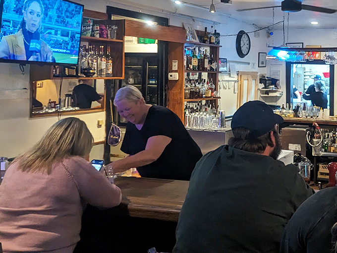 The bar area&mdash;where strangers become friends and friends become family over generous pours and plates of seafood excellence.