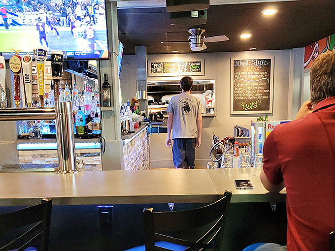 A bar that understands its purpose: to serve great drinks while you contemplate your next menu conquest. The chalkboard specials quietly taunt your willpower.