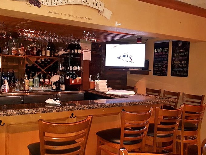 Every proper Italian restaurant needs a bar where you can sip something spirited while contemplating the serious business of pasta selection.