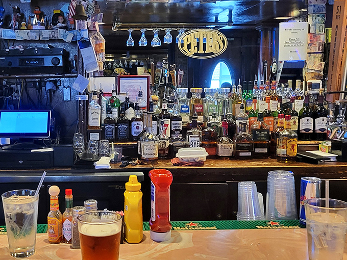 Behind this bar lies liquid wisdom in bottles and taps &ndash; a library of spirits where every selection tells a different story. 