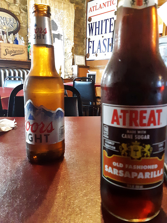 Sometimes happiness is as simple as an ice-cold beer and old-fashioned sarsaparilla, especially when enjoyed against a backdrop of vintage signs.