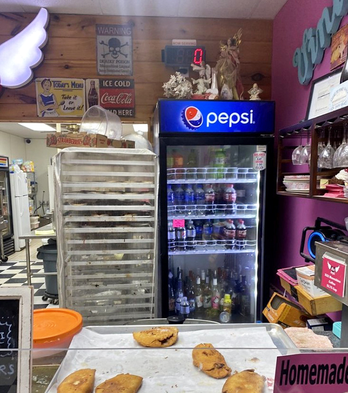 Even the drink cooler looks like it belongs in a Norman Rockwell painting. Those vintage signs transport you to simpler, sweeter times.