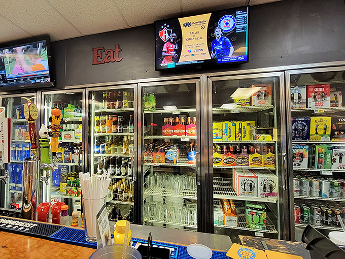 A well-stocked beverage cooler stands ready to complement whatever culinary adventure you're about to embark upon.